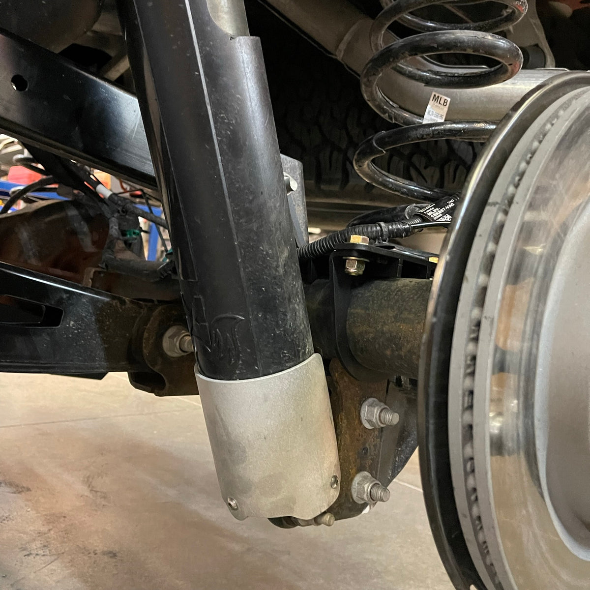 2017 - 2024 Ford Raptor shock guard for rear shock – Foutz Motorsports LLC